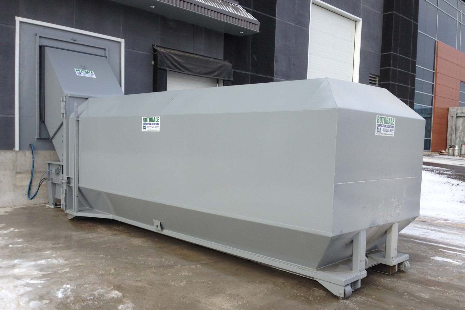 Stationary Compactors Secure Waste Area - Rotobale Compaction Solutions ...